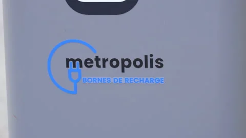 Metropolis logo on the spot of a chargin... | Stock Video | Pond5
