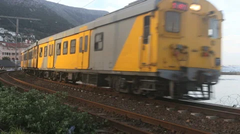 Metrorail commuter train in Kalk Bay | Stock Video | Pond5