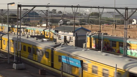 Metrorail commuter trains passing throug... | Stock Video | Pond5