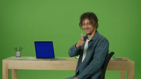 Mexican Student Typing on Blue Screen La... | Stock Video | Pond5