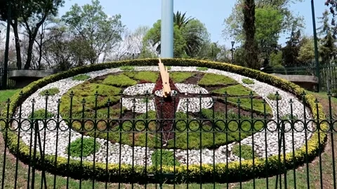 mexico flag and monumental clock in sunk... | Stock Video | Pond5