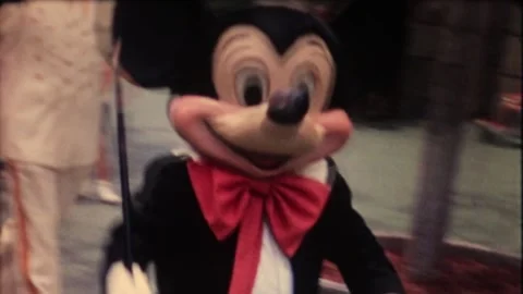 Mickey Mouse in parade of characters at ... | Stock Video | Pond5