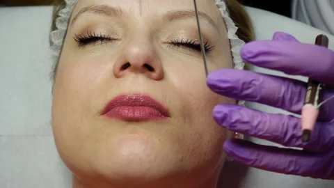 Microblading eyebrows procedure | Stock Video | Pond5