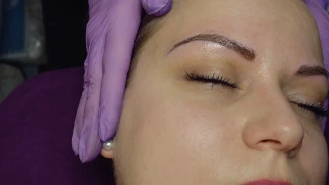 Microblading eyebrows procedure | Stock Video | Pond5