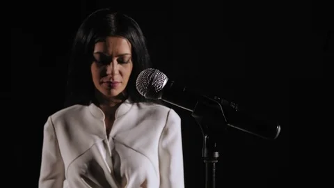 Microphone in hand singer on stage. Sing... | Stock Video | Pond5