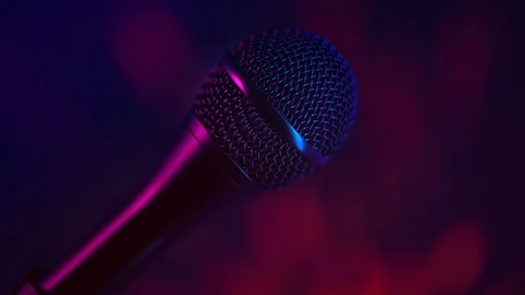 Microphone on stage close-up. Mic rotati... | Stock Video | Pond5
