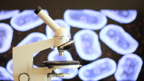 Microscope on the background of moving b... | Stock Video | Pond5