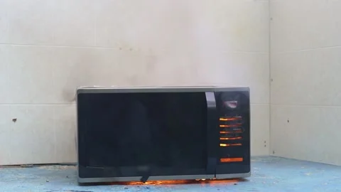 microwave oven on fire. the concept of f... | Stock Video | Pond5