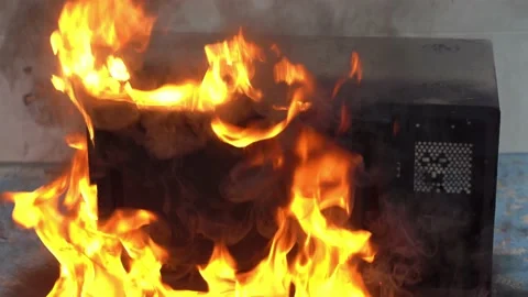 microwave oven on fire. the concept of f... | Stock Video | Pond5