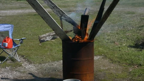 Mid Afternoon Trash Can Fire in Rural We... | Stock Video | Pond5