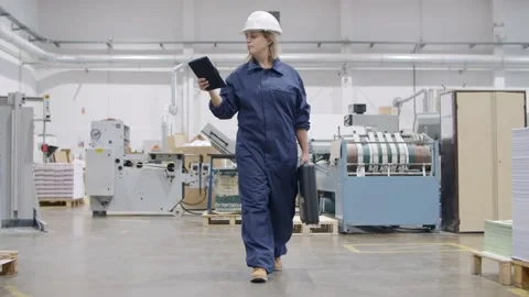 Middle aged female factory engineer with... | Stock Video | Pond5