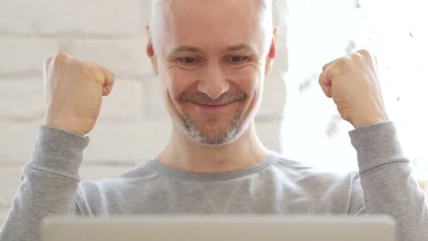 Middle Aged Man Excited for Success at W... | Stock Video | Pond5