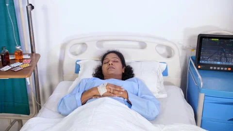 A middle-aged woman recovering from surg... | Stock Video | Pond5