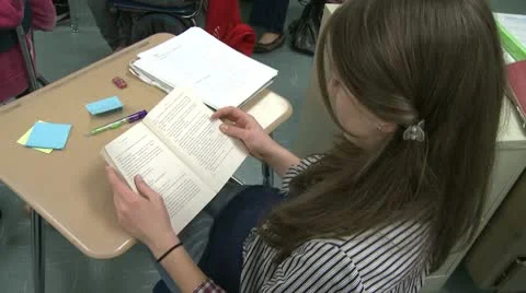 Middle school students reading in classr... | Stock Video | Pond5