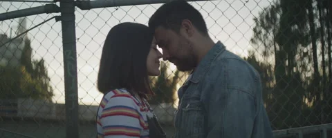 Middle shot of Couple Embracing on field... | Stock Video | Pond5