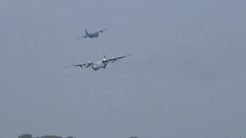 Military Aircraft on final approach into... | Stock Video | Pond5