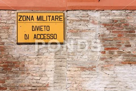Military area, no entry. Sign in Italian language. Army compound. Stock ...