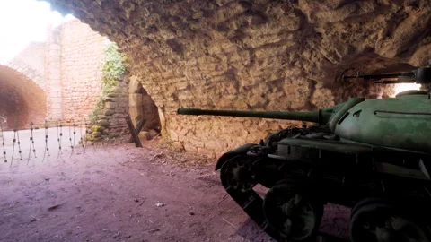 Military armored tanks hiding inside a c... | Stock Video | Pond5