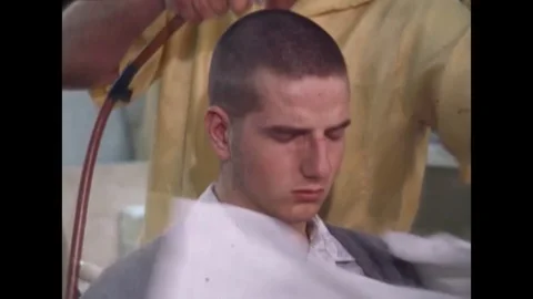 Military barbers shave the heads of new ... | Stock Video | Pond5