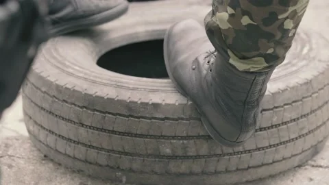 military feet shod in heavy army boots. ... | Stock Video | Pond5