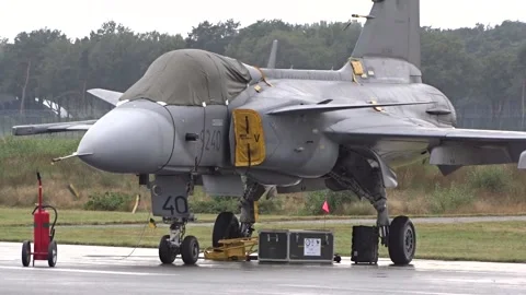 Military Fighter Jet Parked at Air Base | Stock Video | Pond5
