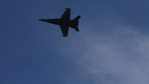 Military fighter jet plane fires bullets... | Stock Video | Pond5