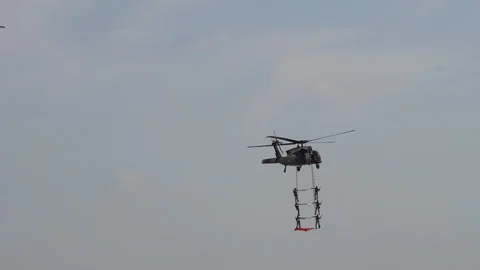 Military helicopter flying close with so... | Stock Video | Pond5