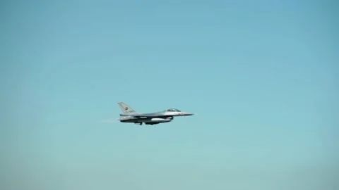 A military jet fighter takes off from th... | Stock Video | Pond5