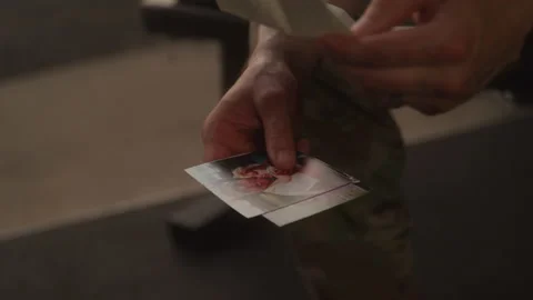 Military Member on Deployment Looking at... | Stock Video | Pond5