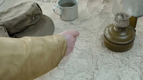Military officer pointing at the map whi... | Stock Video | Pond5