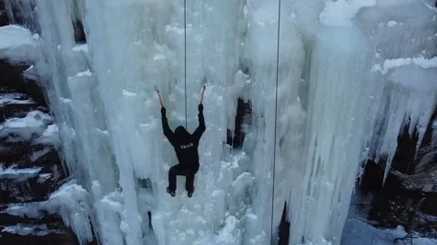 Military personnel swinging ice pick int... | Stock Video | Pond5