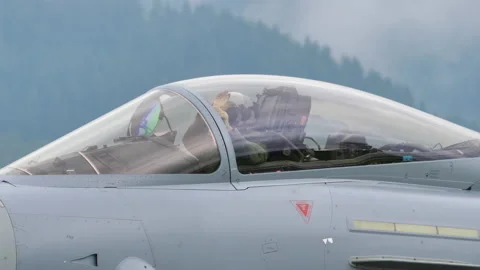 Military pilot saluting from the cockpit... | Stock Video | Pond5
