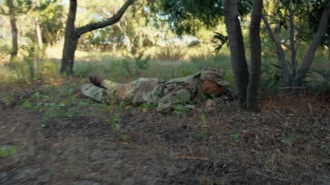 Military Run Away Under The Tree In The ... | Stock Video | Pond5
