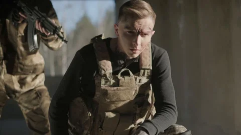 Military soldier captured by the enemy t... | Stock Video | Pond5