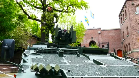 Military soldier standing on tank during... | Stock Video | Pond5
