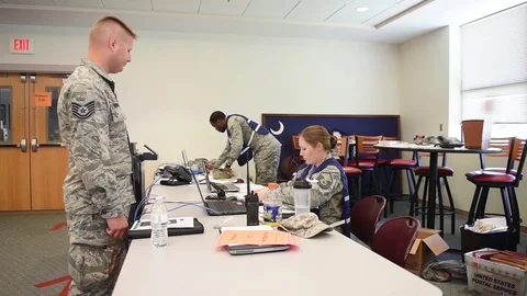Military staff processing airman for dep... | Stock Video | Pond5