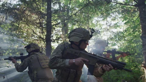 Military Team Pointing Their Rifles in t... | Stock Video | Pond5