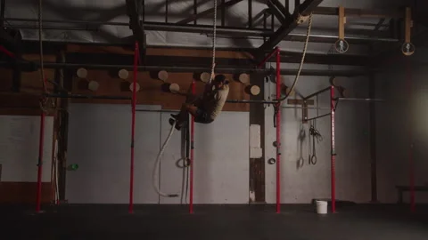 Woman Climbing Rope Stock Footage ~ Royalty Free Stock Videos | Pond5