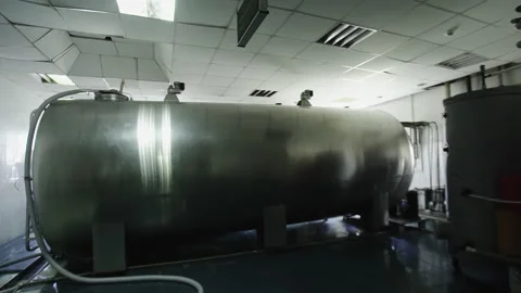Milk storage tank at a dairy plant.. Tan... | Stock Video | Pond5