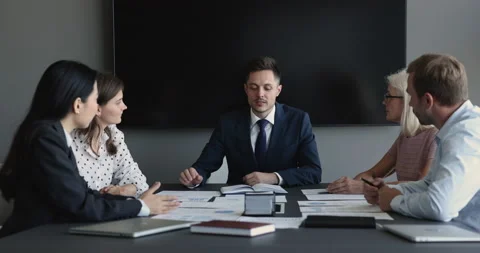 Millennial boss leads group meeting in b... | Stock Video | Pond5