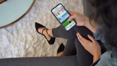 Millennial Girl scrolling on Instagram i... | Stock Video | Pond5