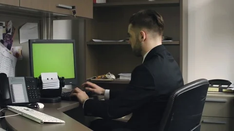 Millennial male office worker types on a... | Stock Video | Pond5