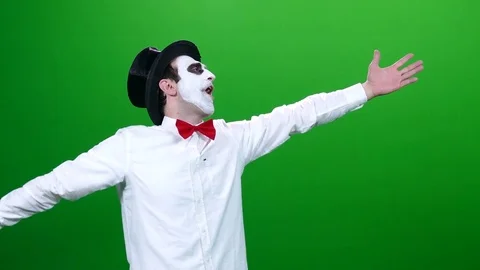 Mime Artist Declaring his Love on Green ... | Stock Video | Pond5