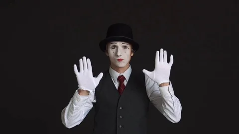 The mime is behind an invisible wall. Bl... | Stock Video | Pond5