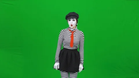 Mime girl is acting like she is photogra... | Stock Video | Pond5