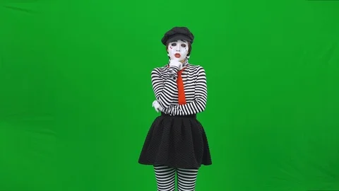 Mime girl acting like she playing with b... | Stock Video | Pond5