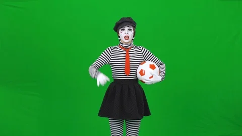 Mime girl is cheering on a football team... | Stock Video | Pond5