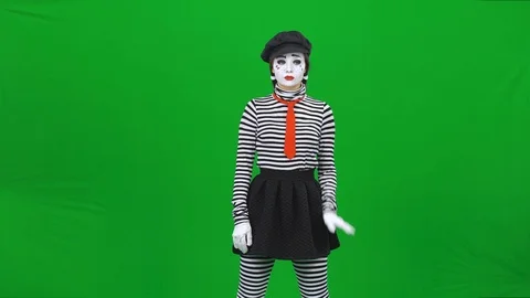 Mime girl is having call, talking. Green... | Stock Video | Pond5