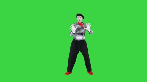 Mime leans to invisible wall on a Green ... | Stock Video | Pond5