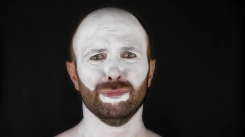 A mime man in a white mask depicts emoti... | Stock Video | Pond5
